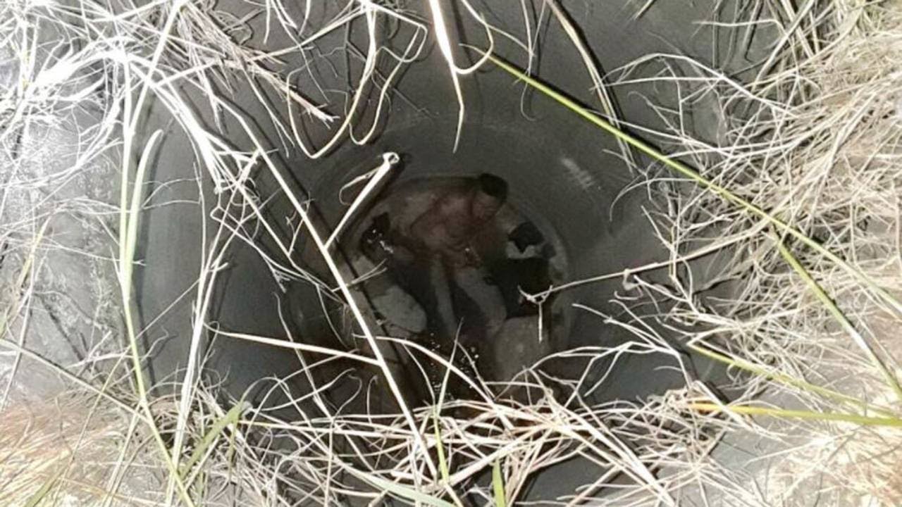 Copy of Man rescued after being stuck in manhole for 6 days, police say ...