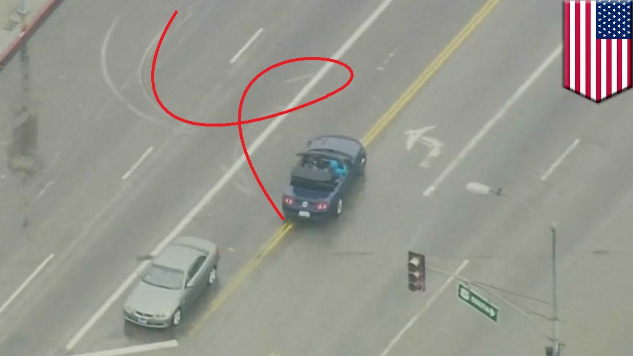 Crazy car chase: robbery suspects spin donuts, pose for selfies, in ...