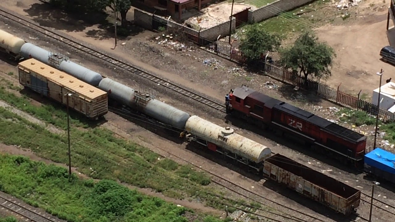 Zambian Railways freighter passing Lusaka trainstation (Zambia) - YouTube