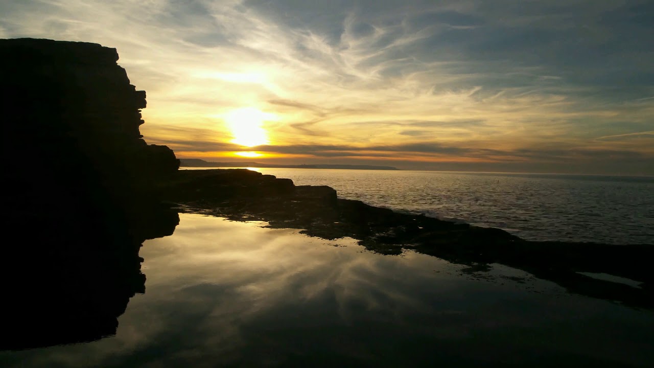 sunset from emperors pool filey brigg - YouTube
