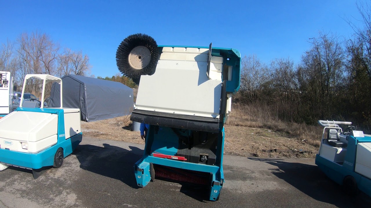 Tennant sweepers walk around - YouTube