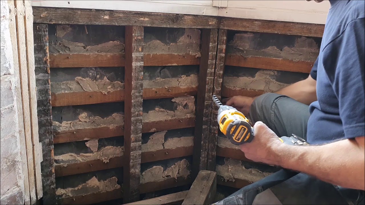 Fitting Wood Packers, Expanding Foam and Deep Gap Filler To the Window ...