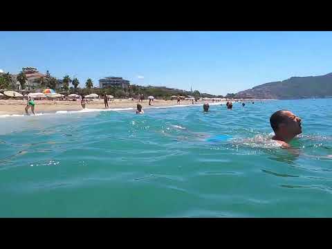 Swimming at the Kleopatra Beach. Alanya Turkey.
