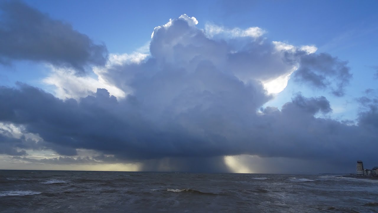 Gigantic Shower Cloud Off Hastings Beach..! - YouTube