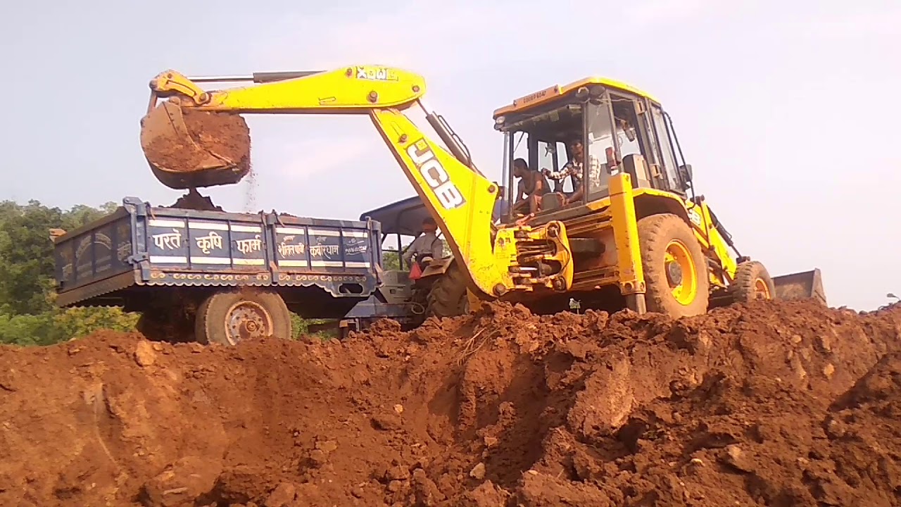 Two JCB Backhoe Machine Throwing Out Broken Bridge Concrete and Tractor ...