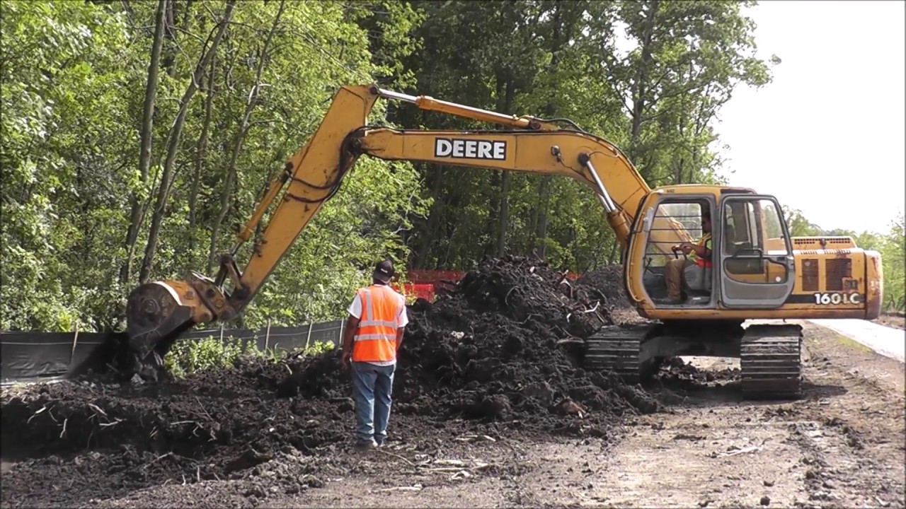 Excavator Digging Trench - YouTube