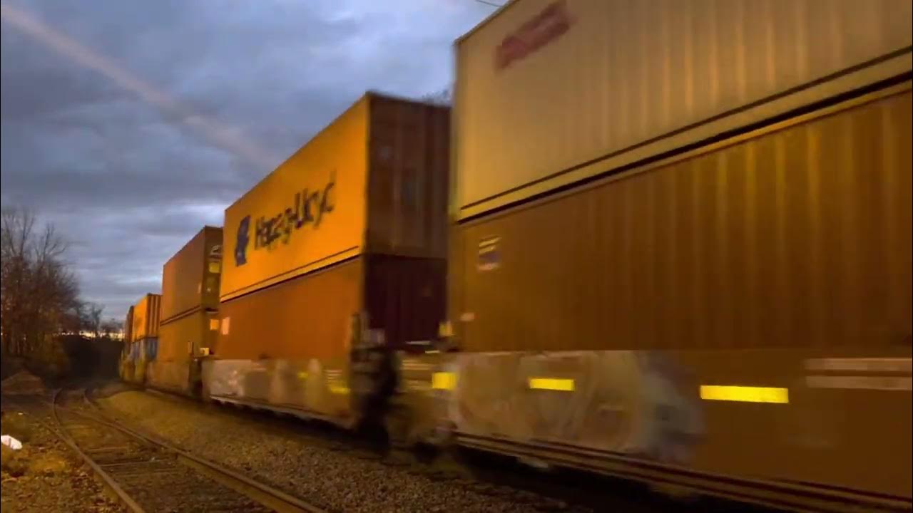 NS 1207 SD70ACe leads NS 268 with a UP SD70ACe trailing & a fouled K5LLA horn at Piscataway,NJ ...