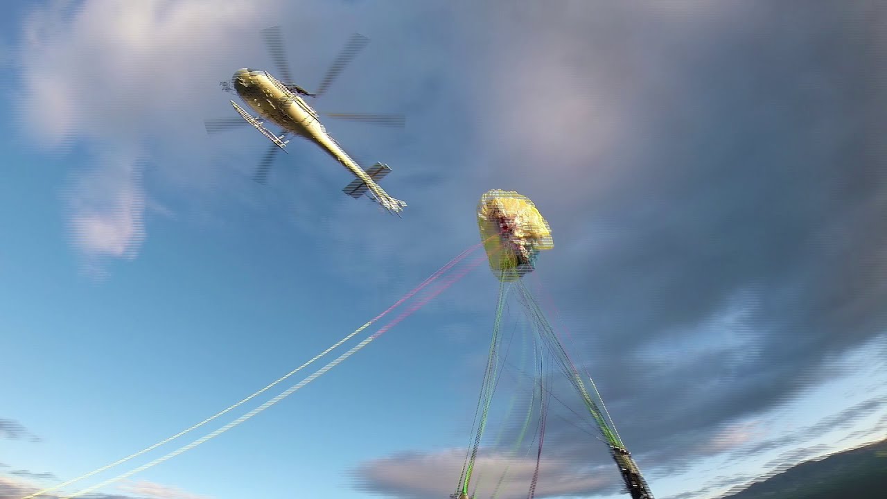 Funky paraglider jump from helicopter - YouTube