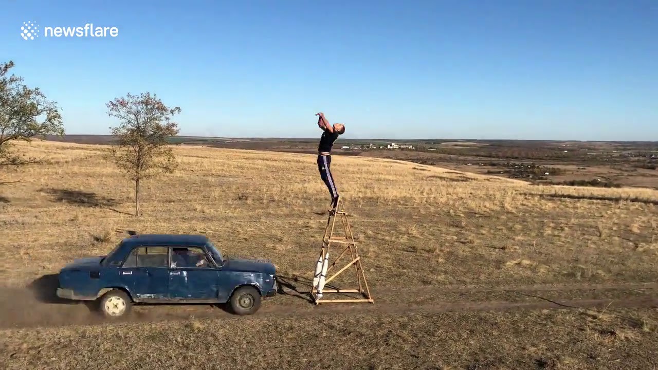 Russian daredevil attempts insane car jump stunt across the seasons ...