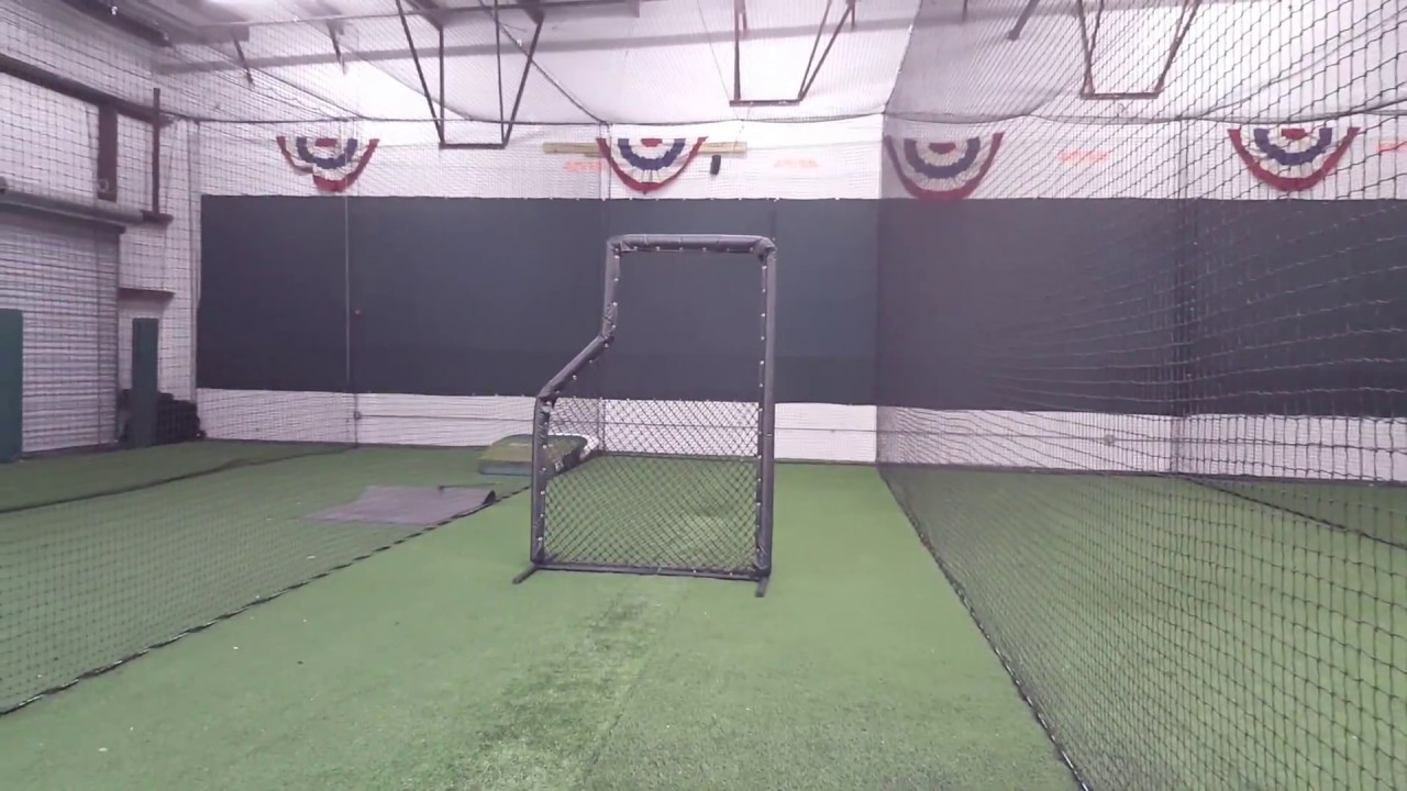 Indoor baseball batting cage facility - YouTube