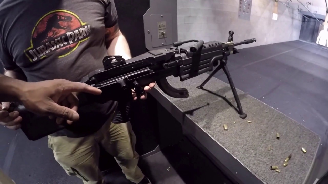 Ruger 10/22 Rifle Converted Into a M249 Machine Gun - YouTube