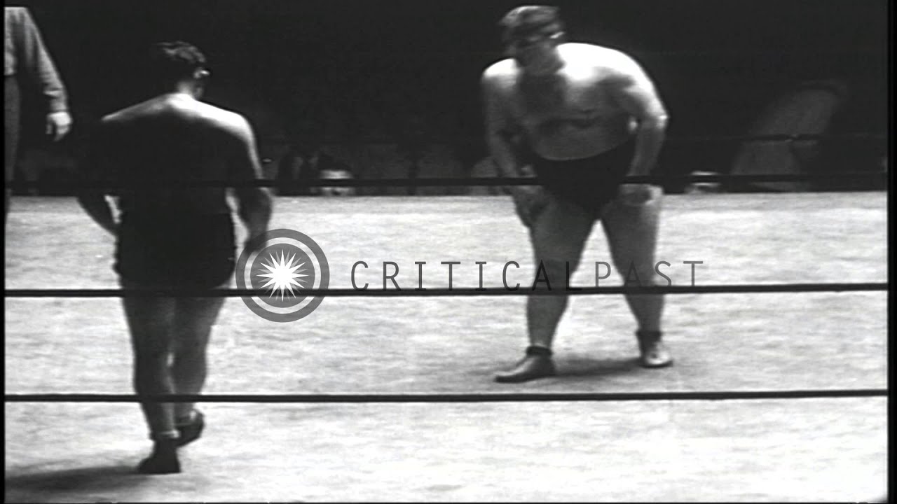 Contortionists wrestle in a ring in New York, United States. HD Stock ...