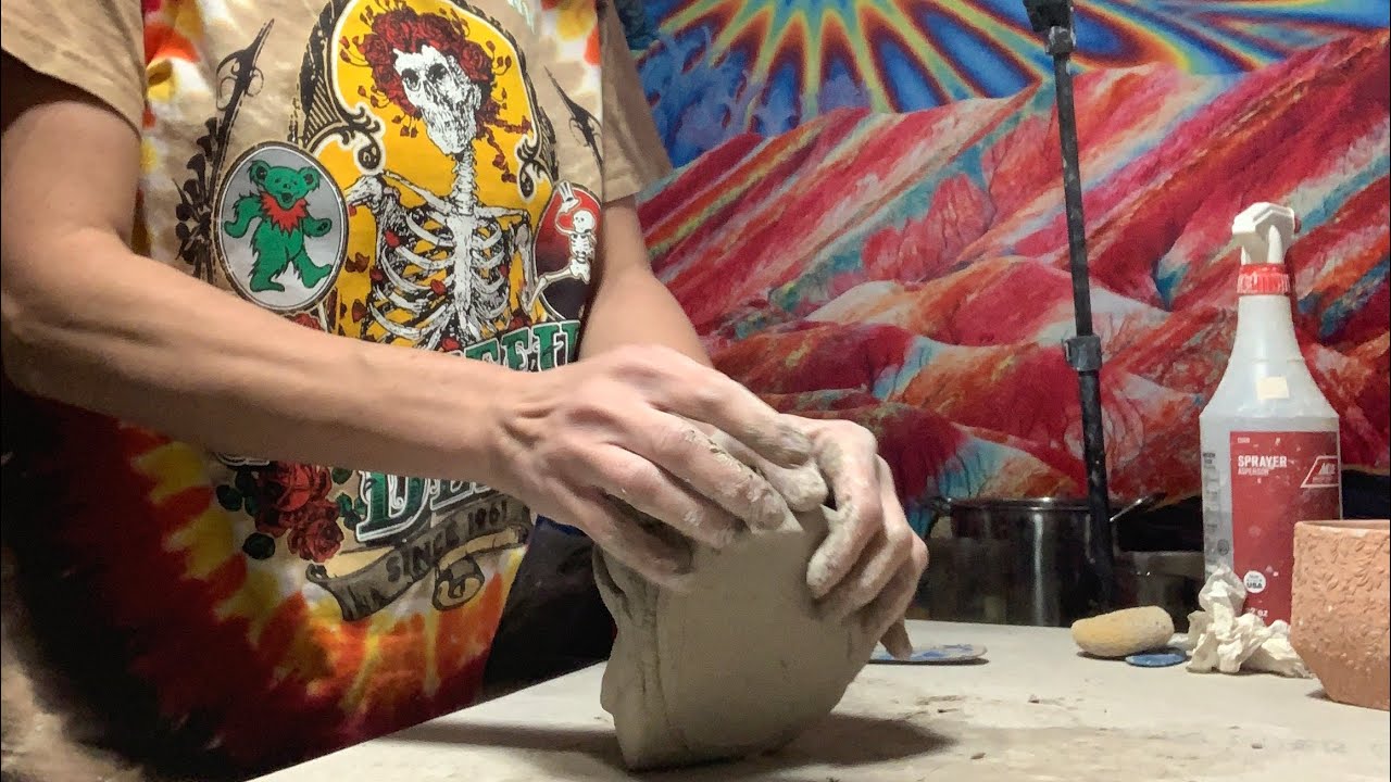 Wedging reclaimed clay in slow motion. Check out those forearm muscles ...
