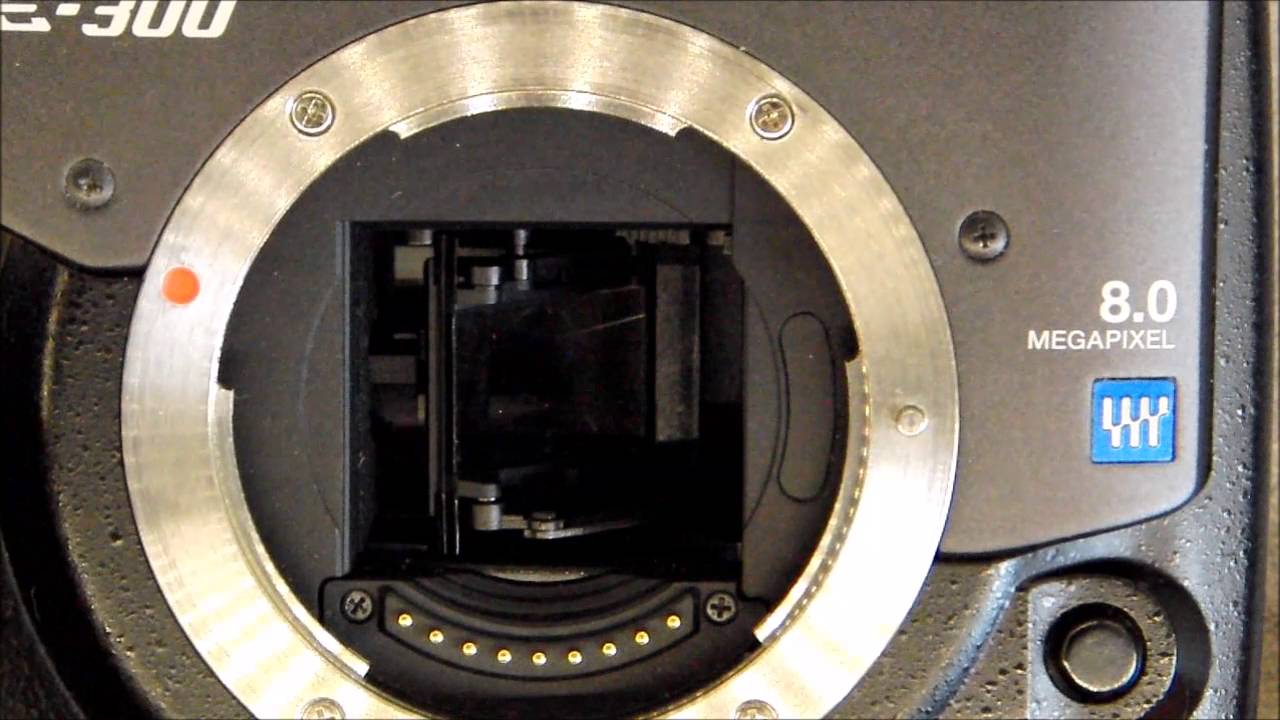 The unusual mirror box on the Olympus E-300 DSLR - YouTube