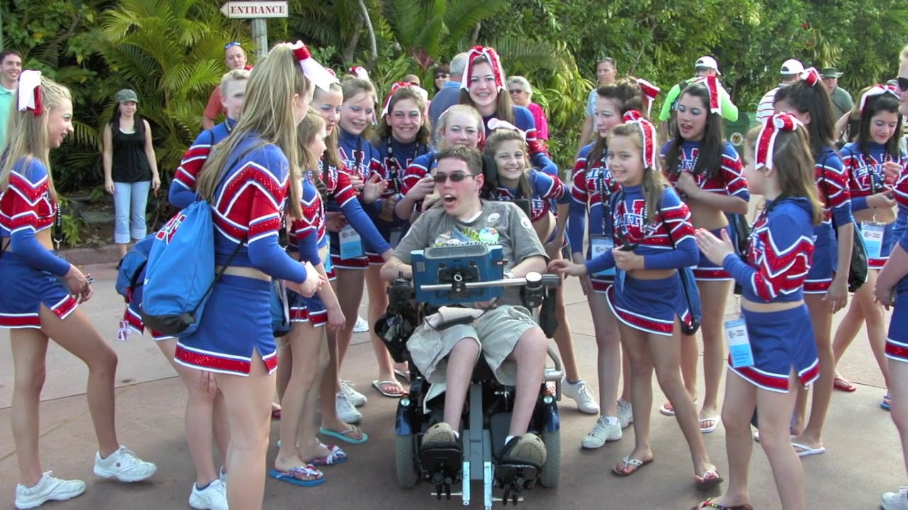 Dan at Disney with cheerleaders - YouTube