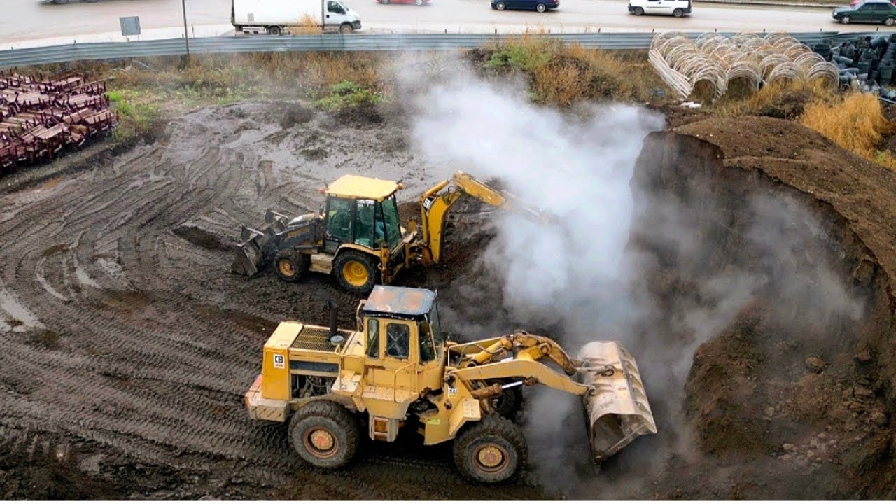 CAT loader working in ember storage area - YouTube