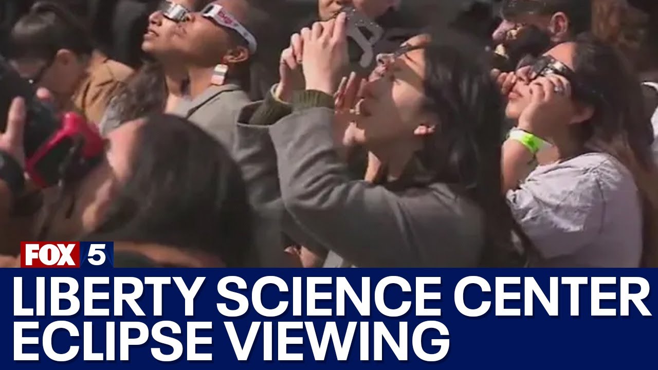 Eclipse viewing at the Liberty Science Center - YouTube