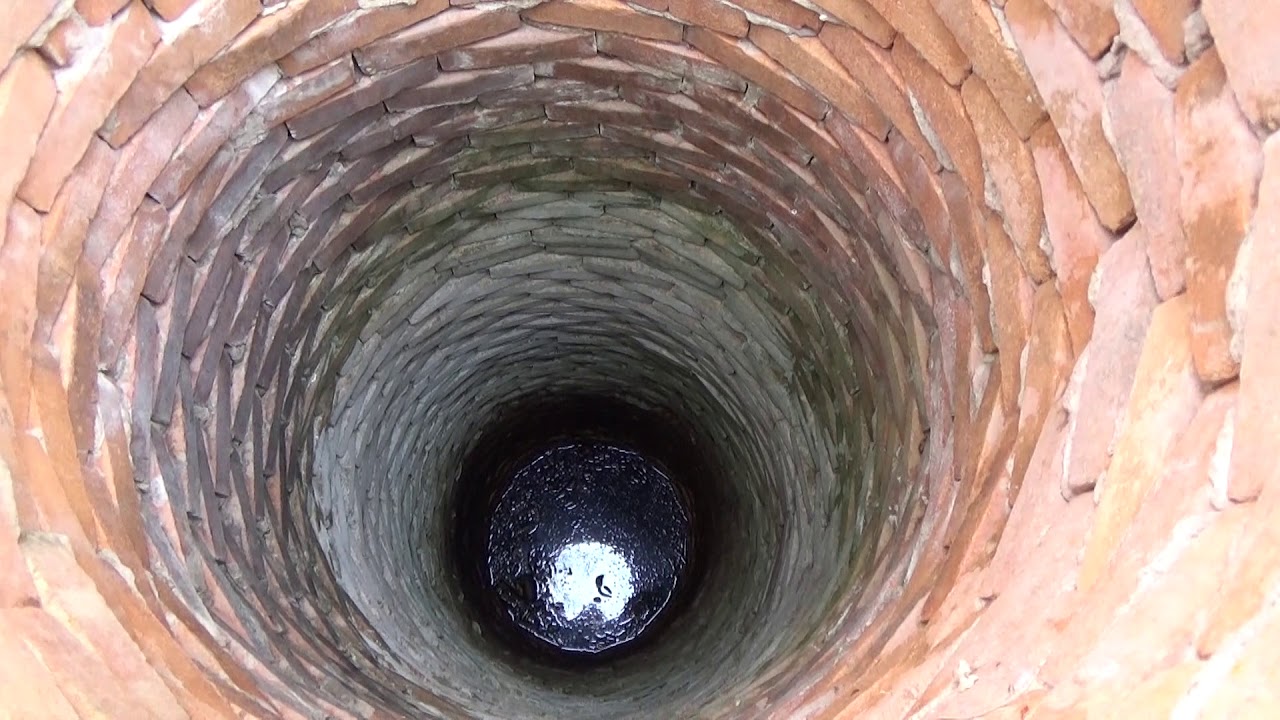 Exploring the inside of a brick well in Manor, Texas - YouTube