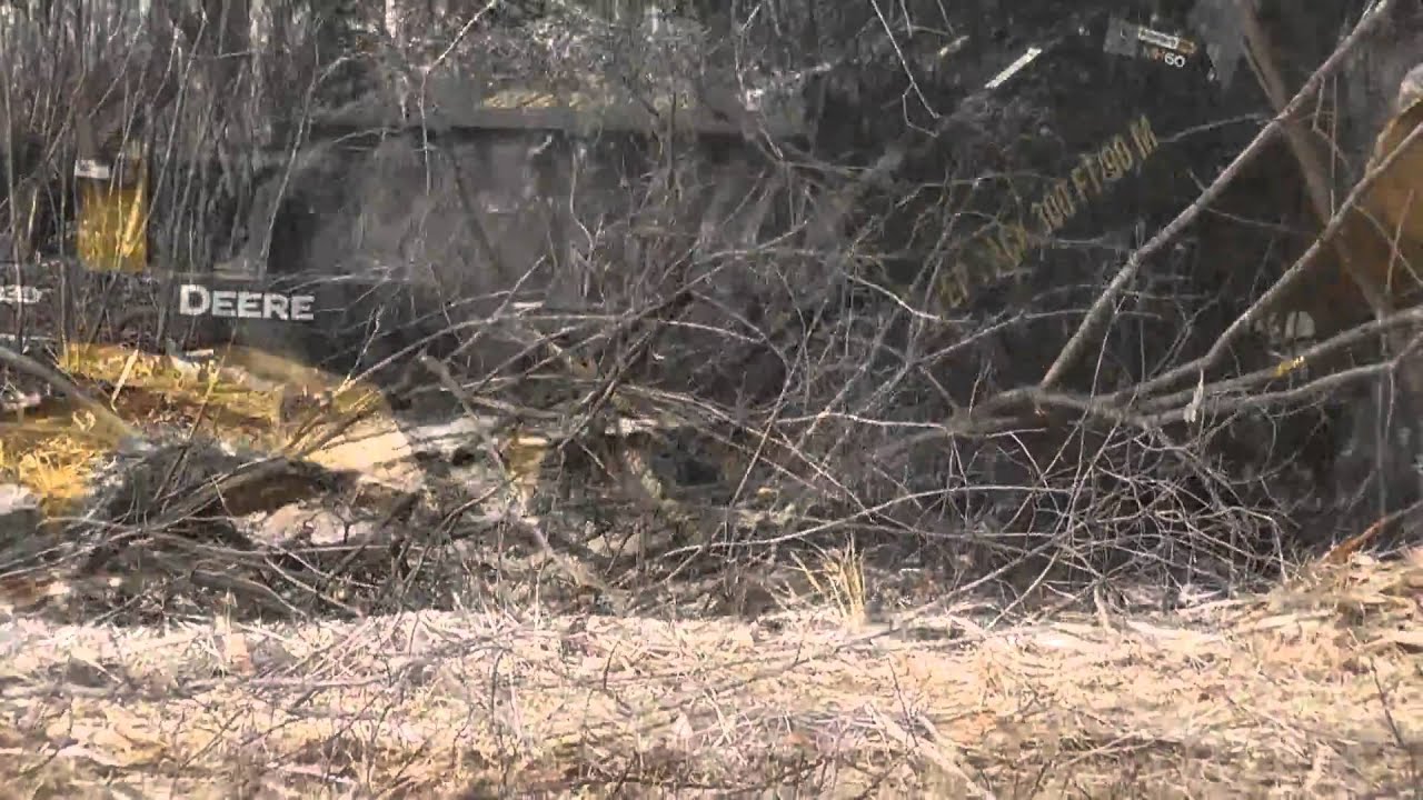 John Deere 333D with Fecon Mulching Head - YouTube