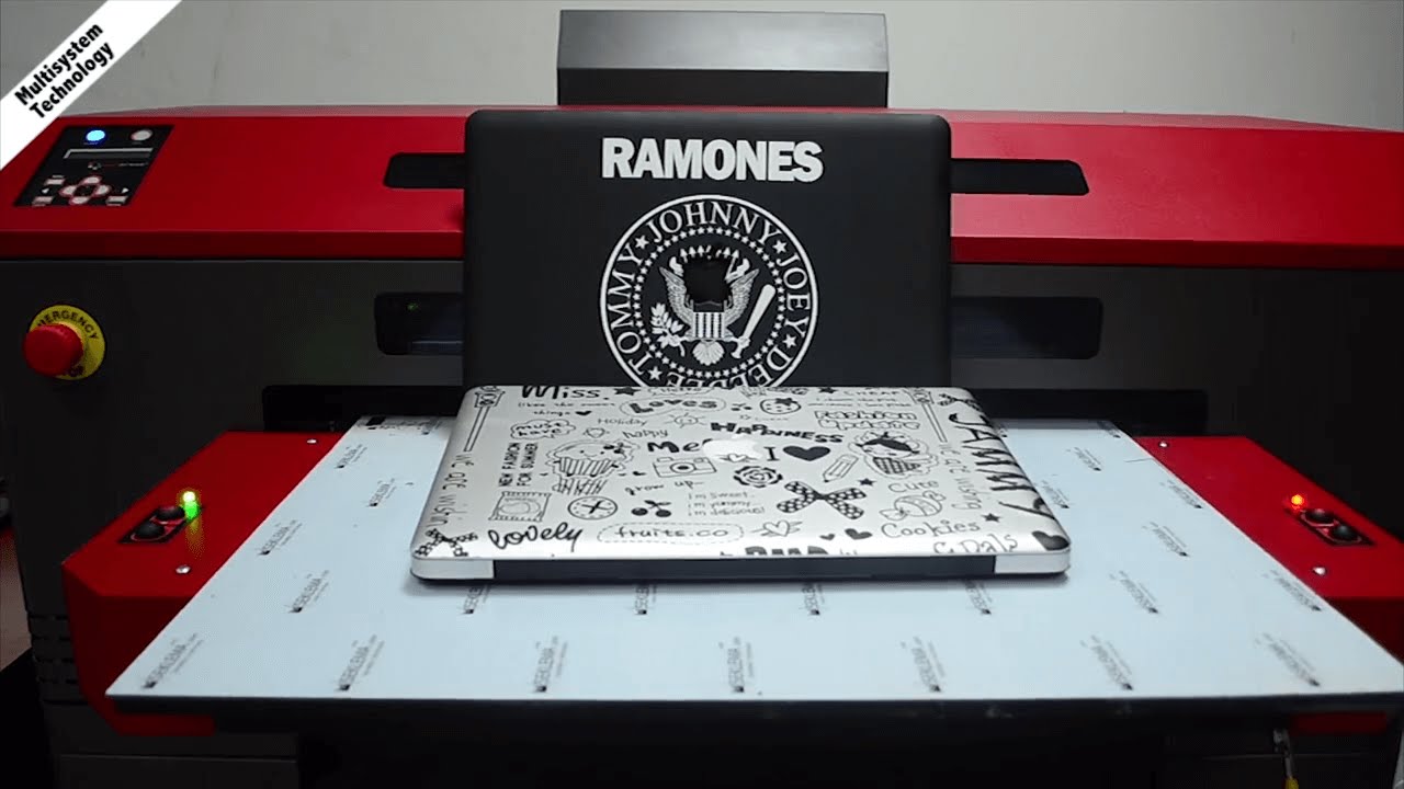 طباعة (UV) على غطاء الاب توب باستخدام iUV600s - YouTube