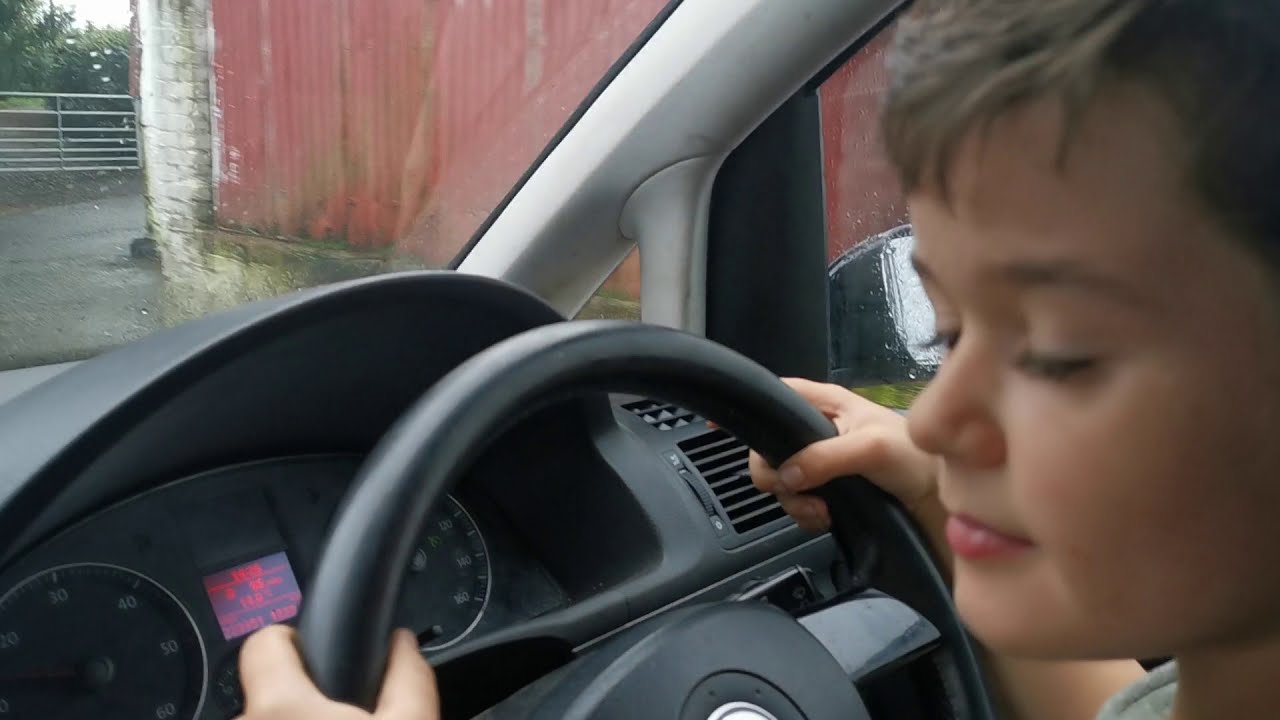 8 year old driving his Dad's car. - YouTube