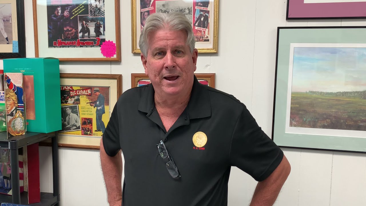 This Coin Shop Owner has just opened a new coin & collectibles shop ...
