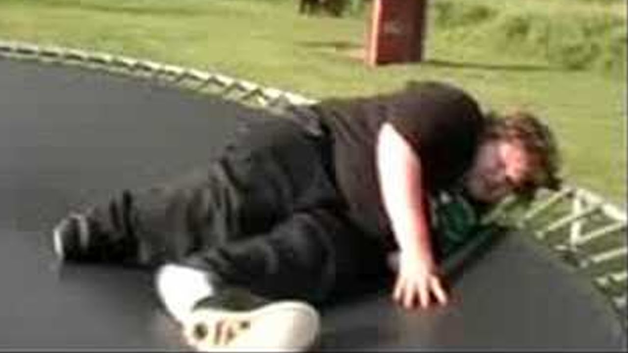 MAN FALLS THROUGH TRAMPOLINE - YouTube