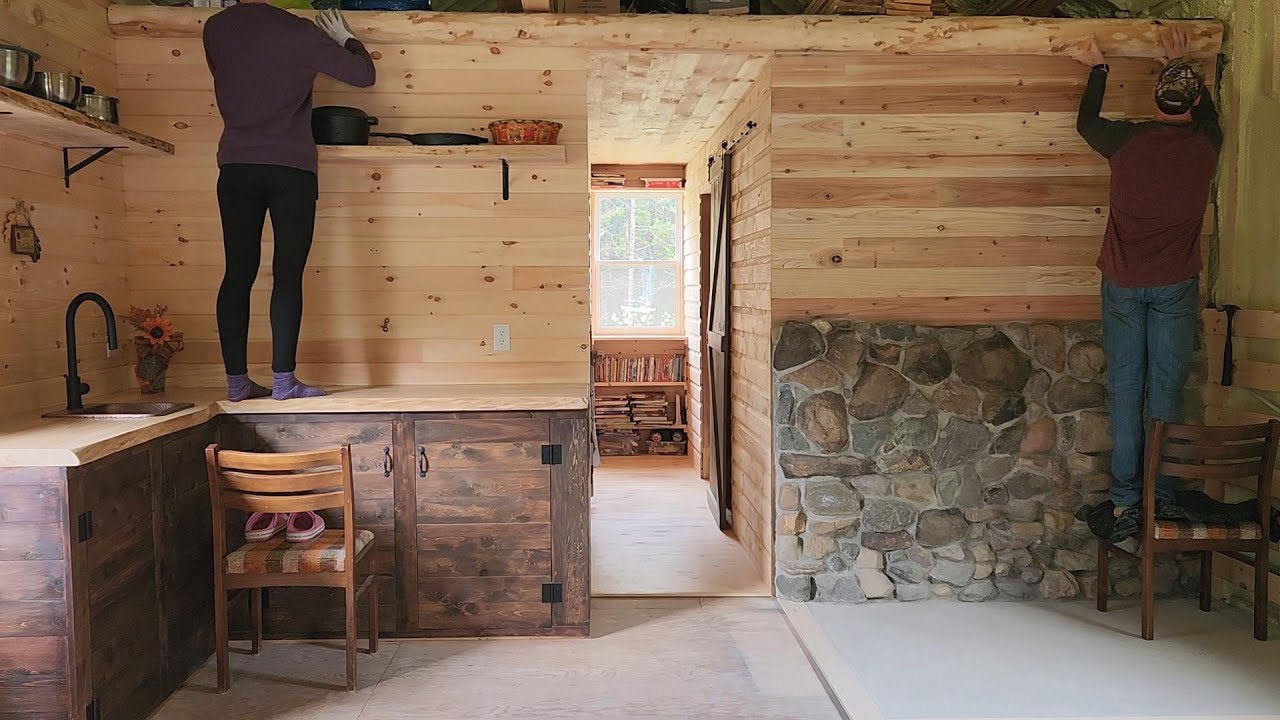 Building A Rock Wall In Our Off Grid Cabin - YouTube