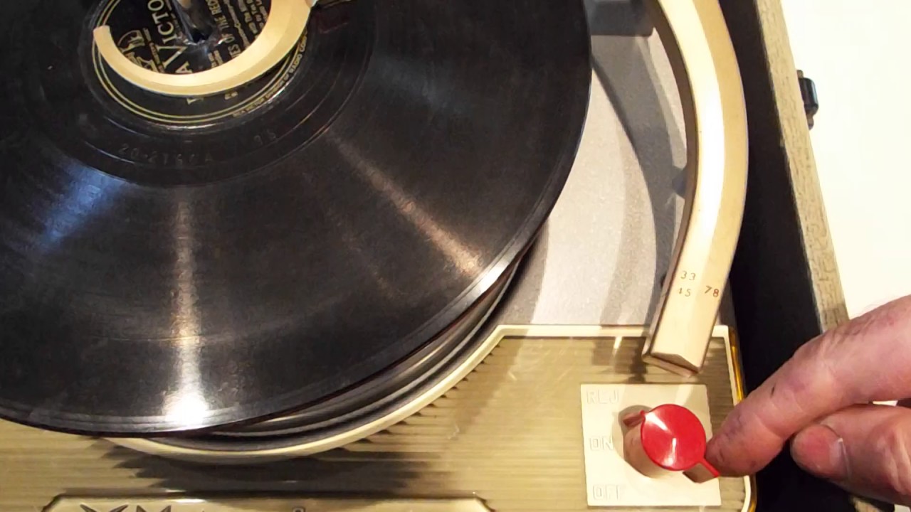 Voice of Music 4 speed automatic record player playing a 78 RPM record ...