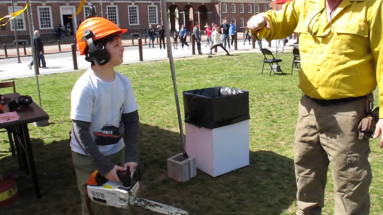 learning to use a chainsaw - YouTube