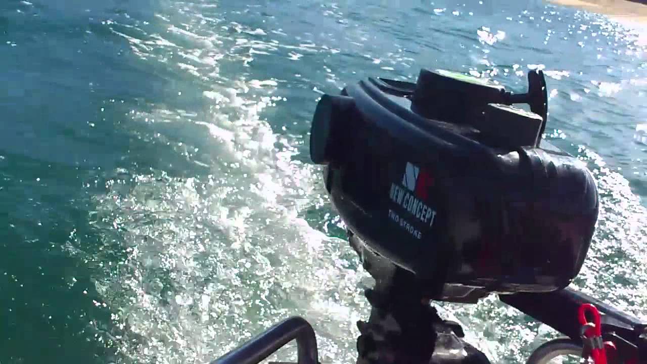 2.3hp outboard motor on inflatable boat round tail - YouTube