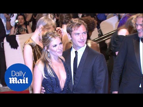 Jude Law and Sienna Miller on the red carpet together in 2010 - Daily Mail