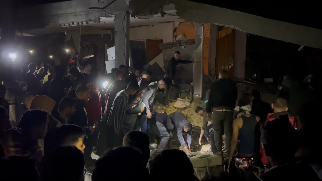 Rescuers search rubble after Israeli airstrike hits residential ...