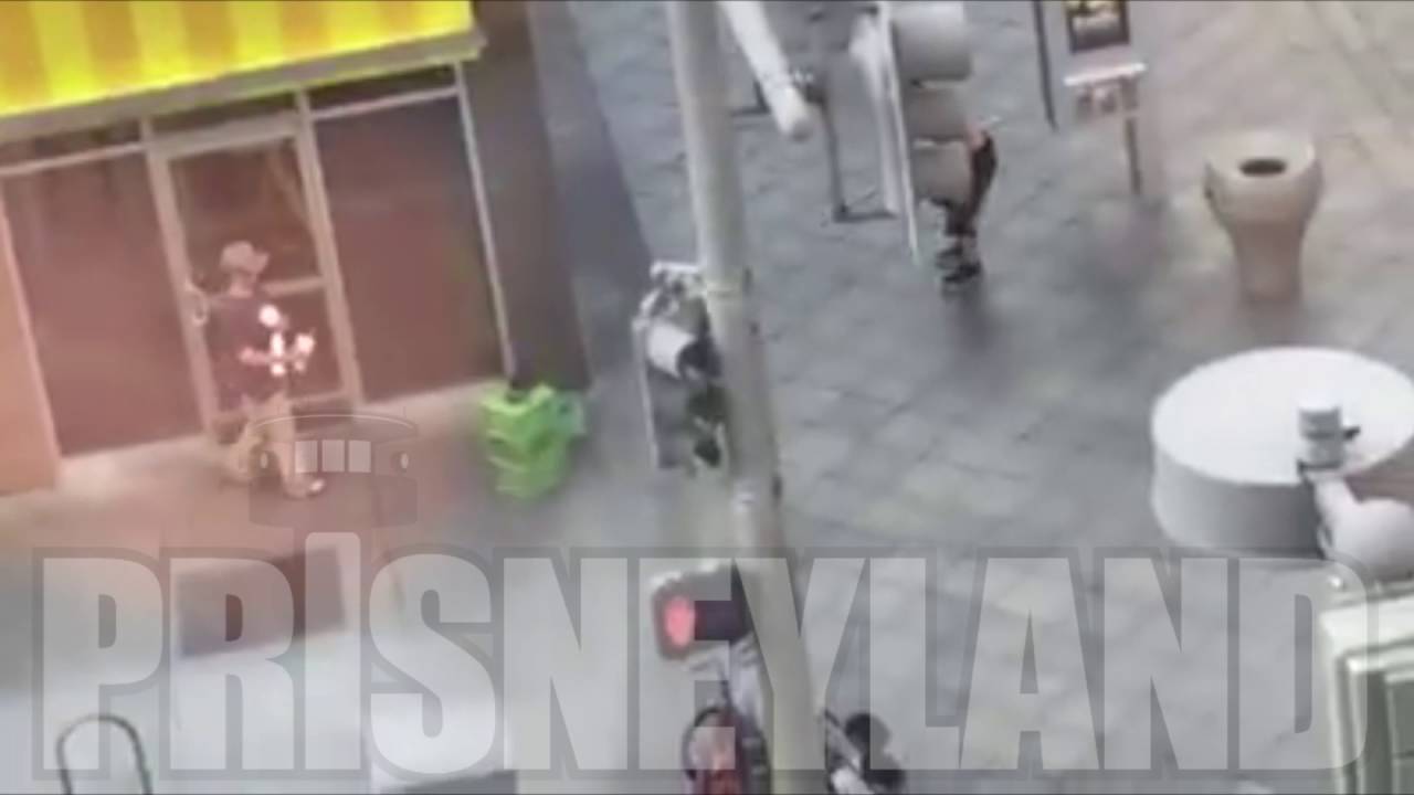 Violent Lunatic Attacks People with a Pole - YouTube