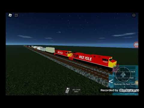RED ISLE ES44AH leads manifest & intermodal with a red isle ac4400cw 9011 trailing in bankrupty ...
