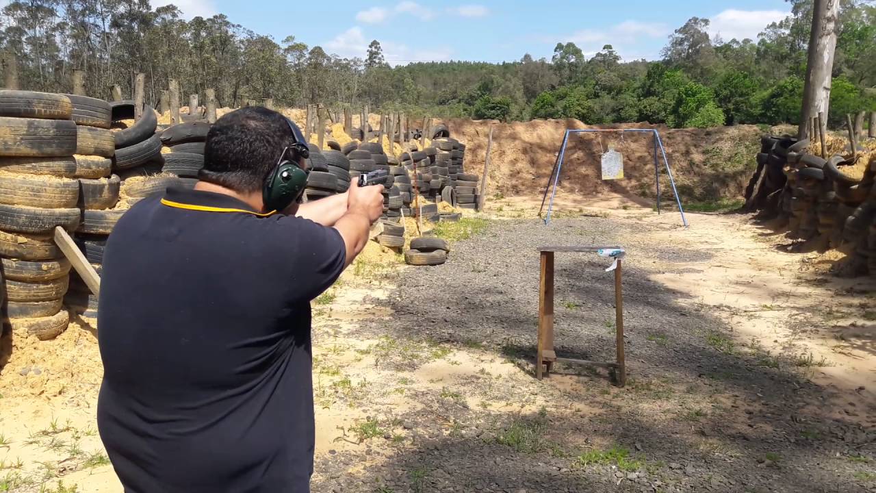 Pistola Taurus PT840 calibre 40 ferrolho inox fosco. - YouTube