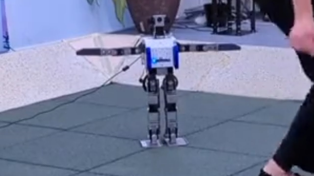 Silly Robot Tries To Play Soccer But Keeps Tripping - YouTube