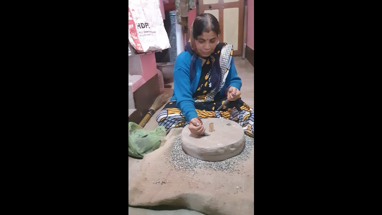 Biri grinding by Stone grinder - Odia desi stone grinder - YouTube