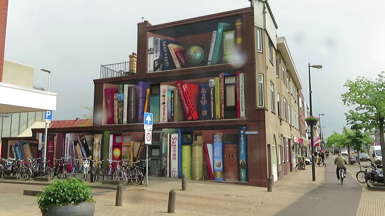 Muurschildering Boekenkast Utrecht - Kunstenaar Jan is de Man - YouTube