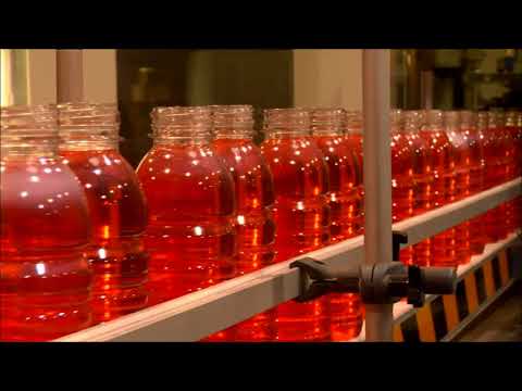 LiquiForm® machine in action-from preform to filled bottle - YouTube
