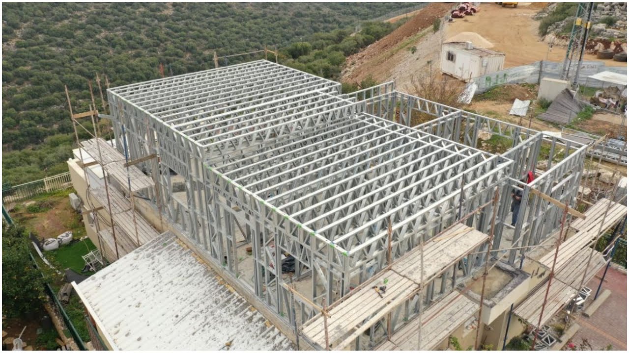 Light gauge steel frame building with lightweight concrete infill ...