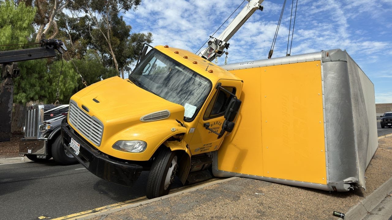 Box truck rollover on the freeway - box comes off the frame! - YouTube