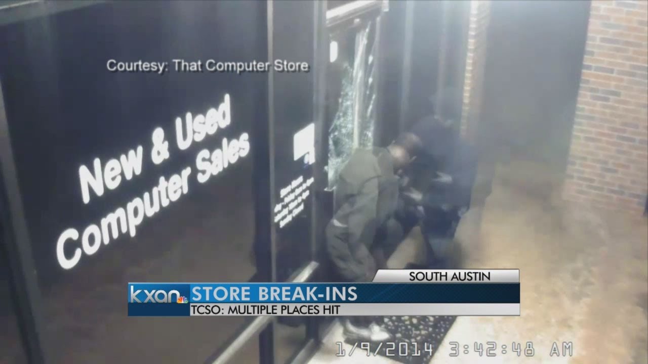 Camera catches thieves breaking into store - YouTube