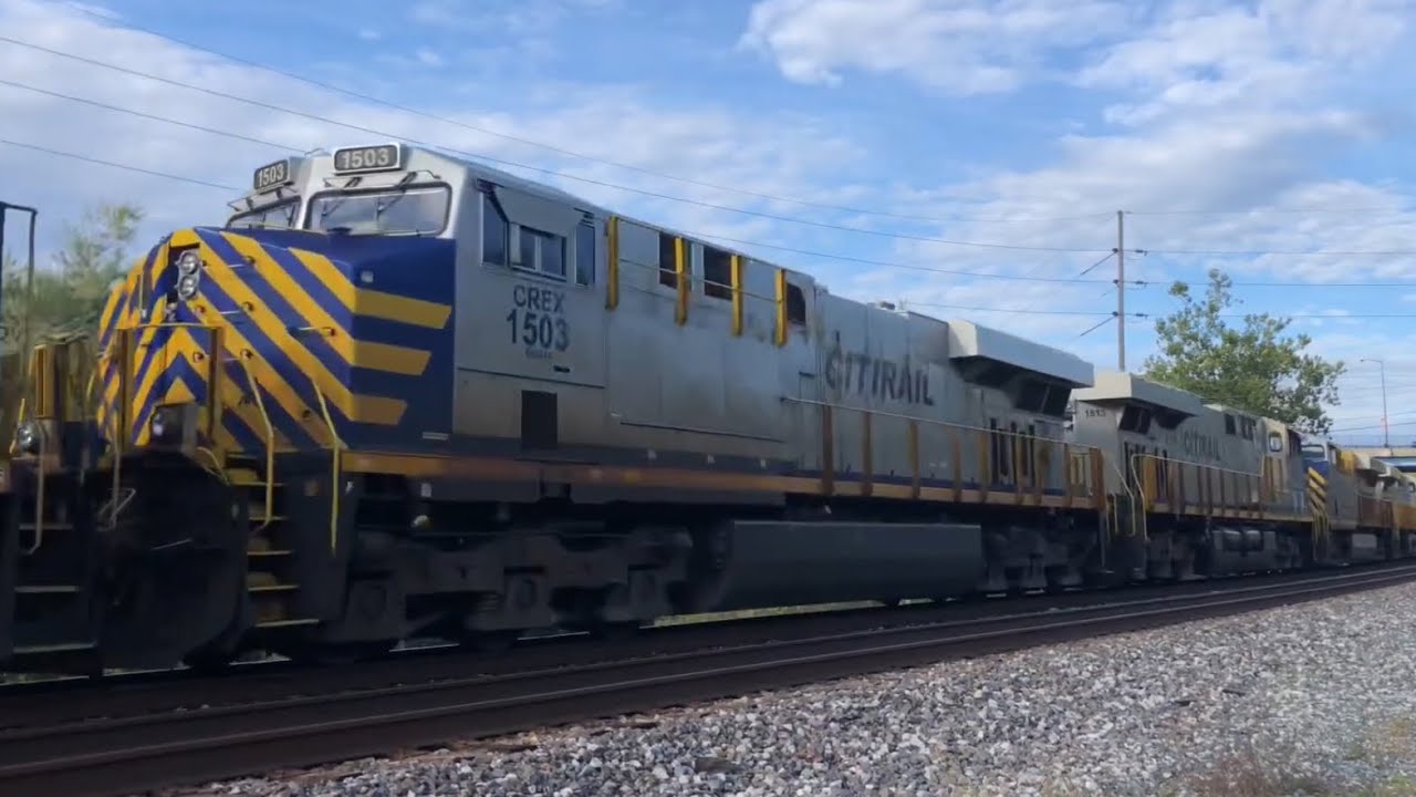 4 CITI rail ES44ACs trail on Q369 on there way to CN plus a csx GP38 ...