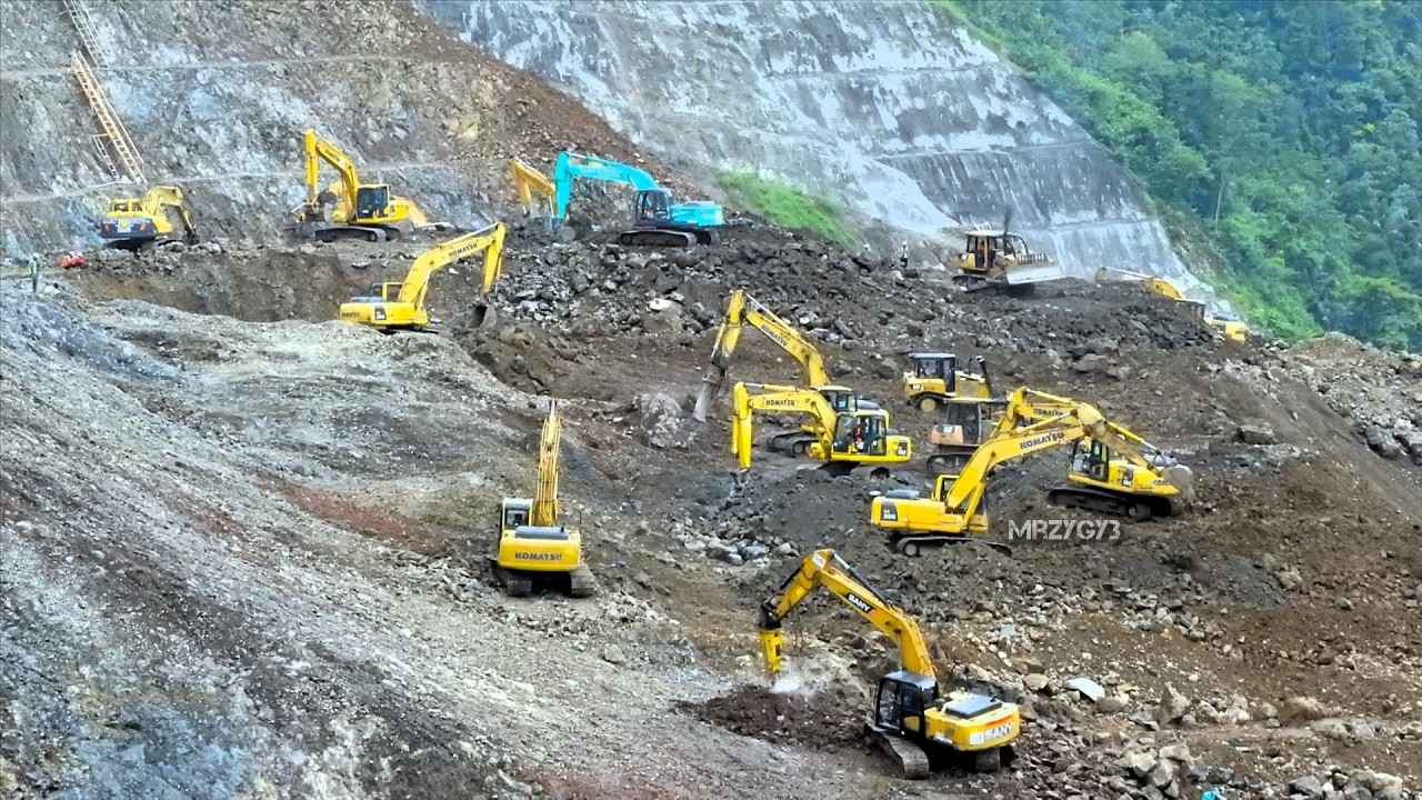Dam Construction - Excavators Bulldozer Earthmover Working Hard Digging ...