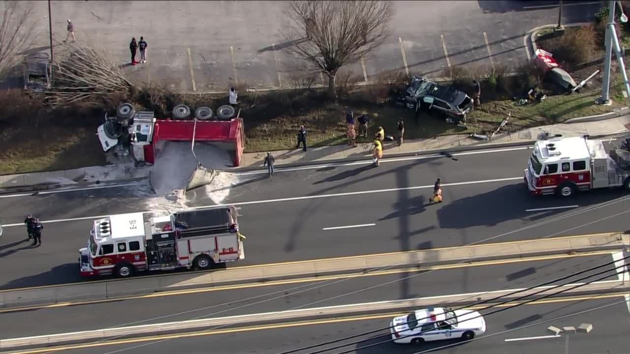 Dump truck overturns after crash in Fullerton area - YouTube