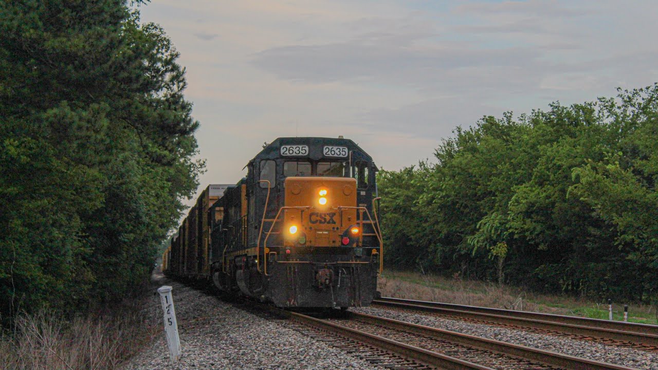 CSX 2635 and CSX 6972 lead M765-03 past Long Island, AL - YouTube