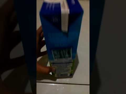 Cara membuka tutup susu kotak