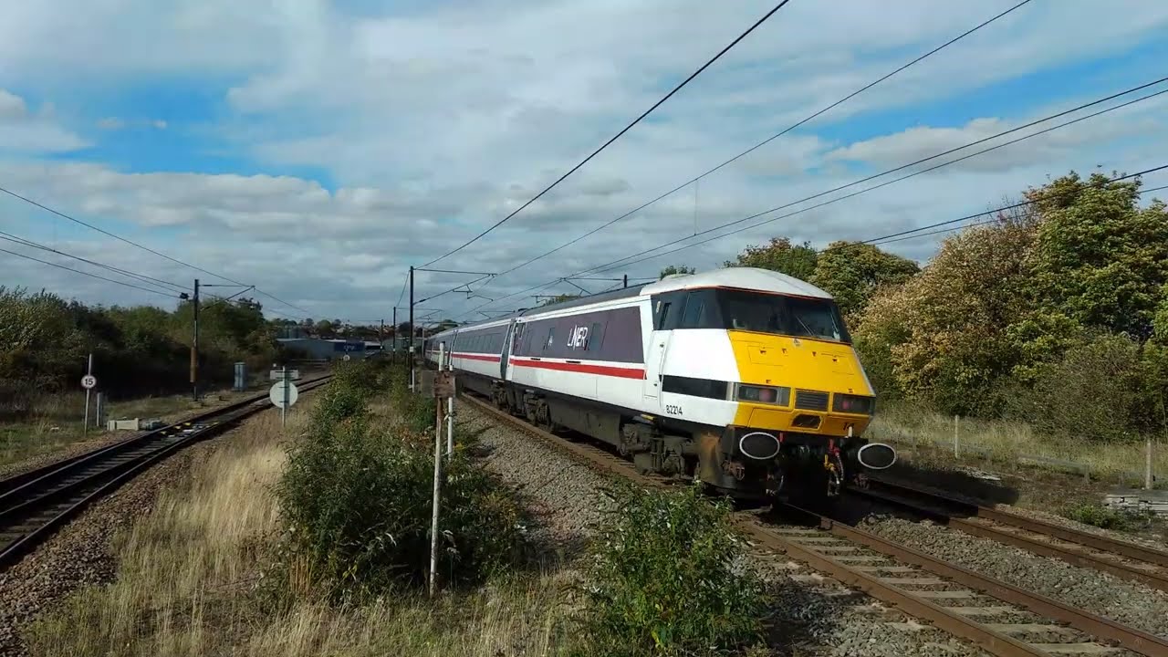 LNER 91114 'Durham Cathedral' departing Grantham Station heading ...
