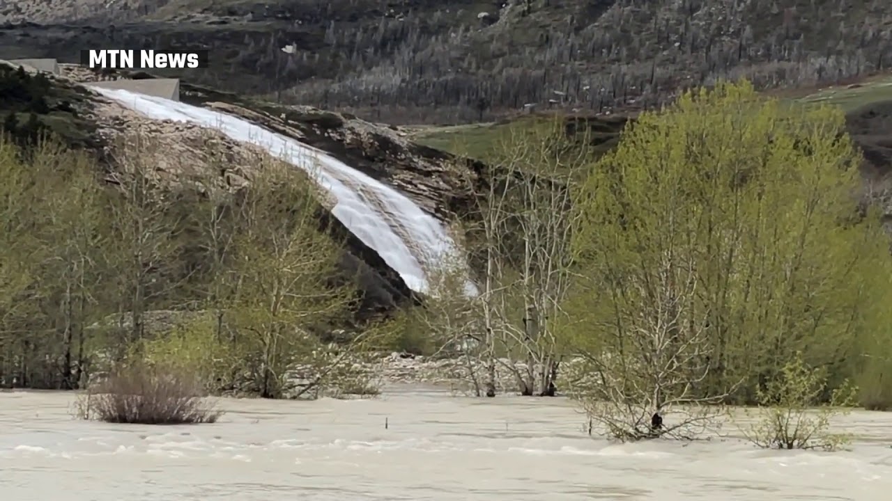 Swift Dam is full, water being released through spillway - YouTube